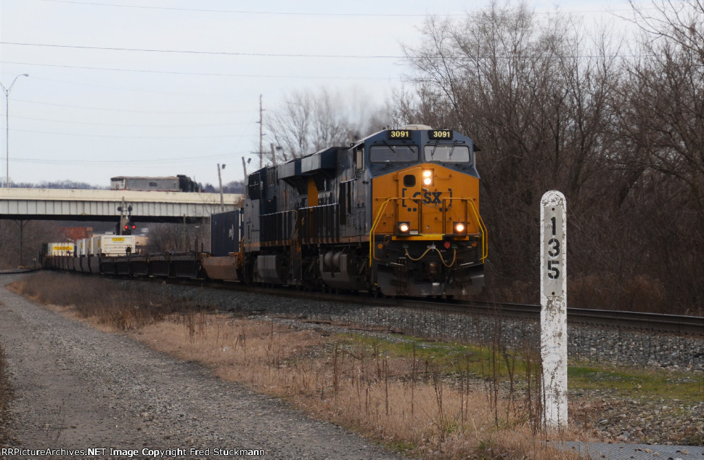 CSX 3091 is west at MP 135.